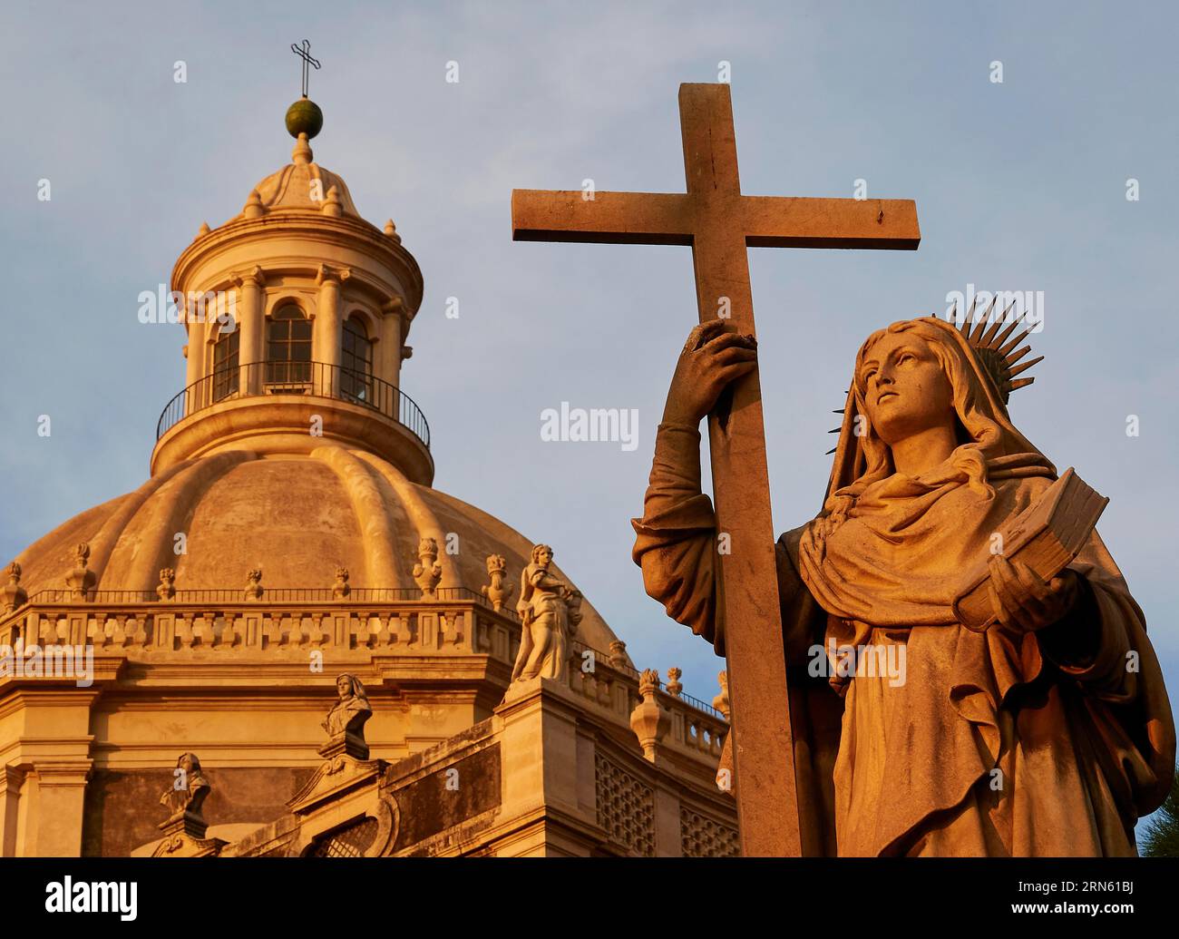 Dome, Statue of a woman, Fortes in fide, Cross, Evening light, Catania ...
