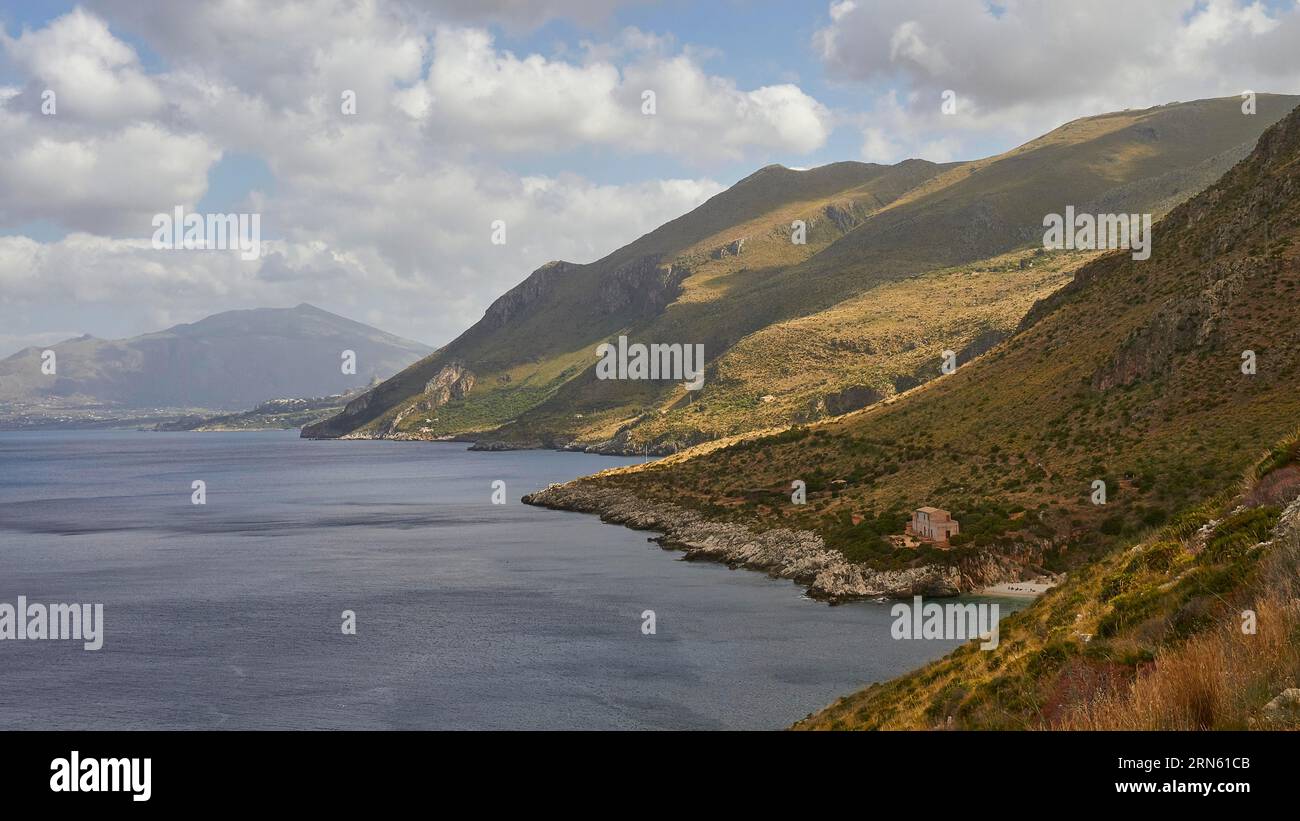 Cloudy weather, coastline, green coastal mountains, small bay, Zingaro ...