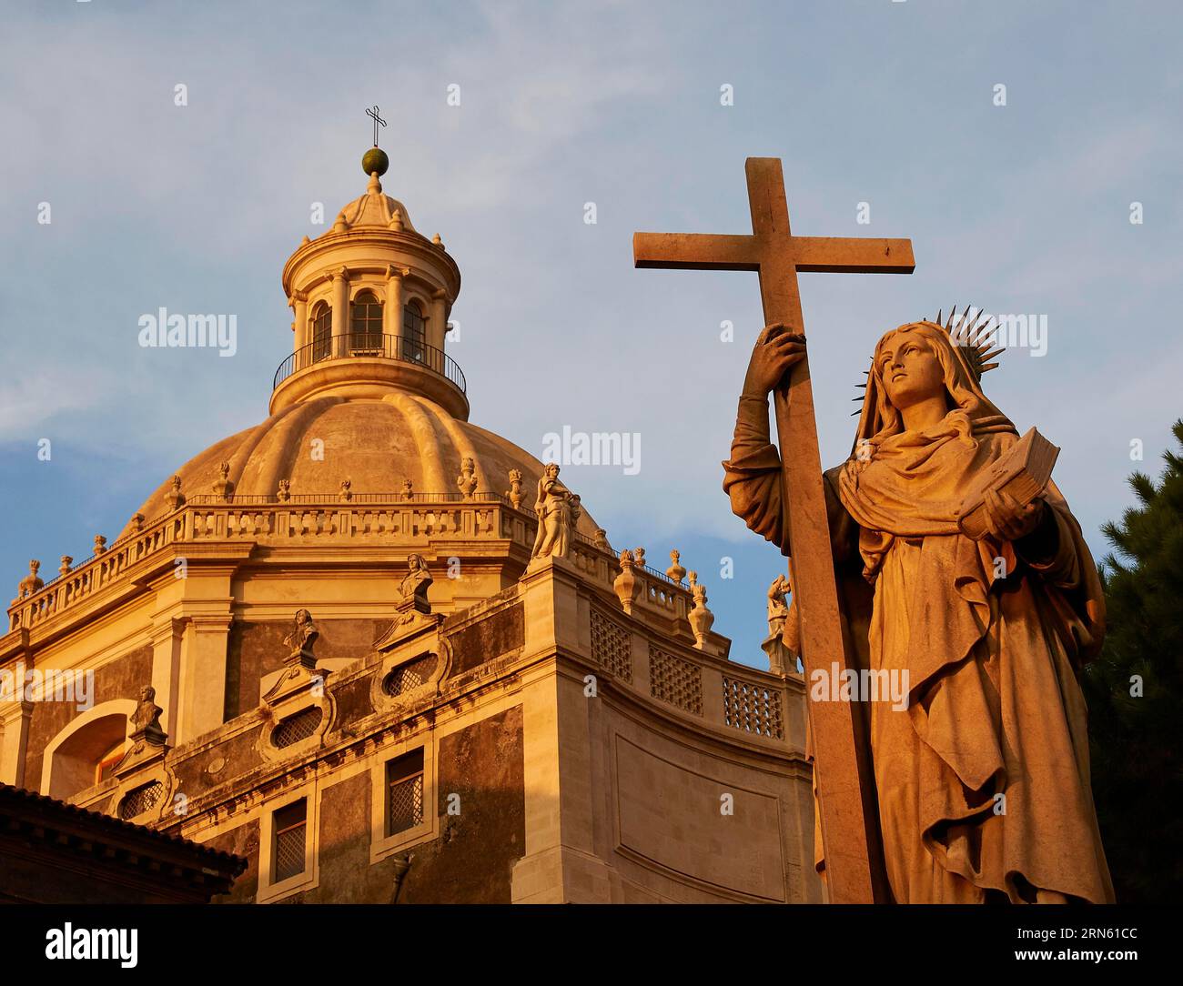Dome, Statue of a woman, Fortes in fide, Cross, Evening light, Catania ...