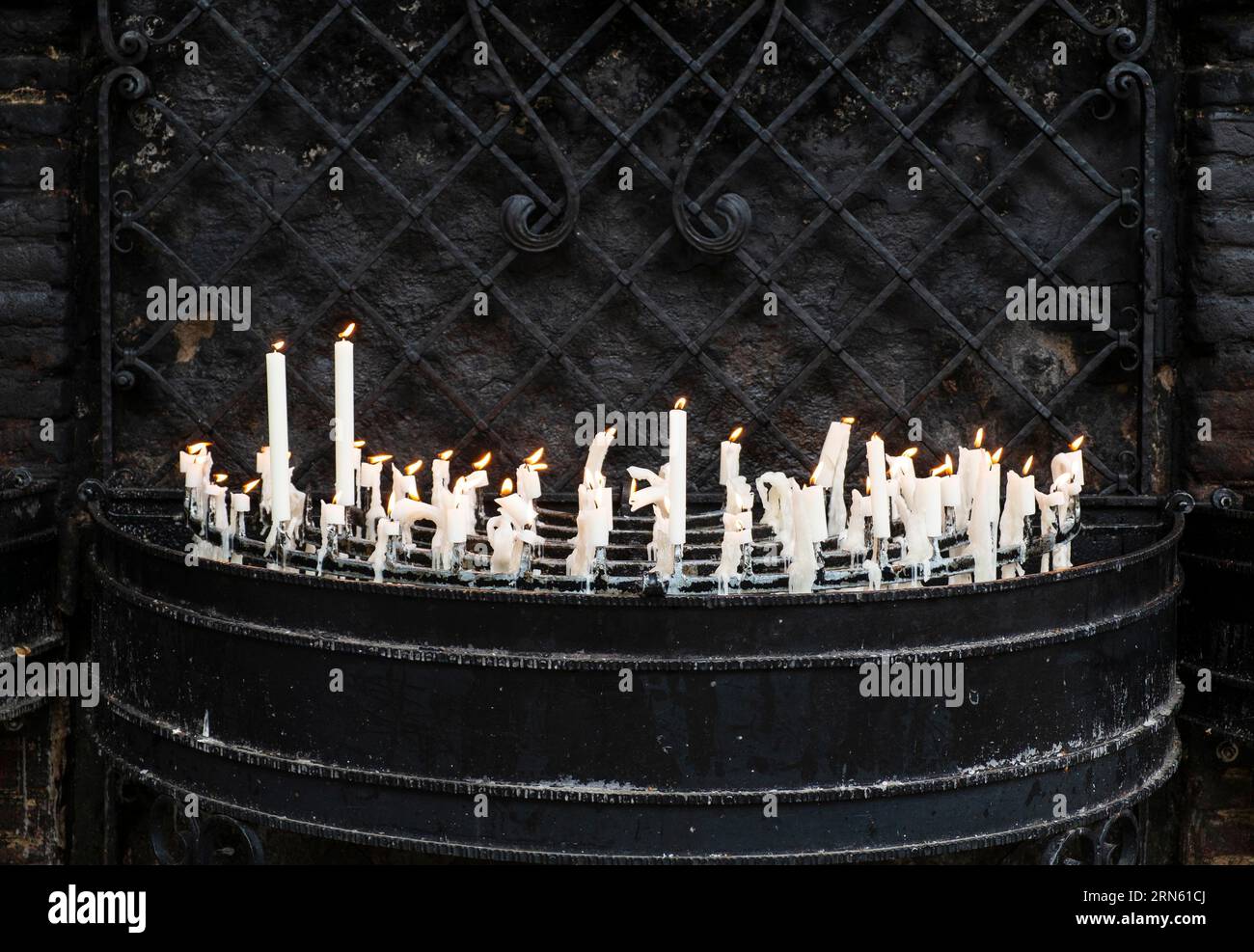 Devotional candles in a candlestick at the pilgrimage site Kevelaer ...