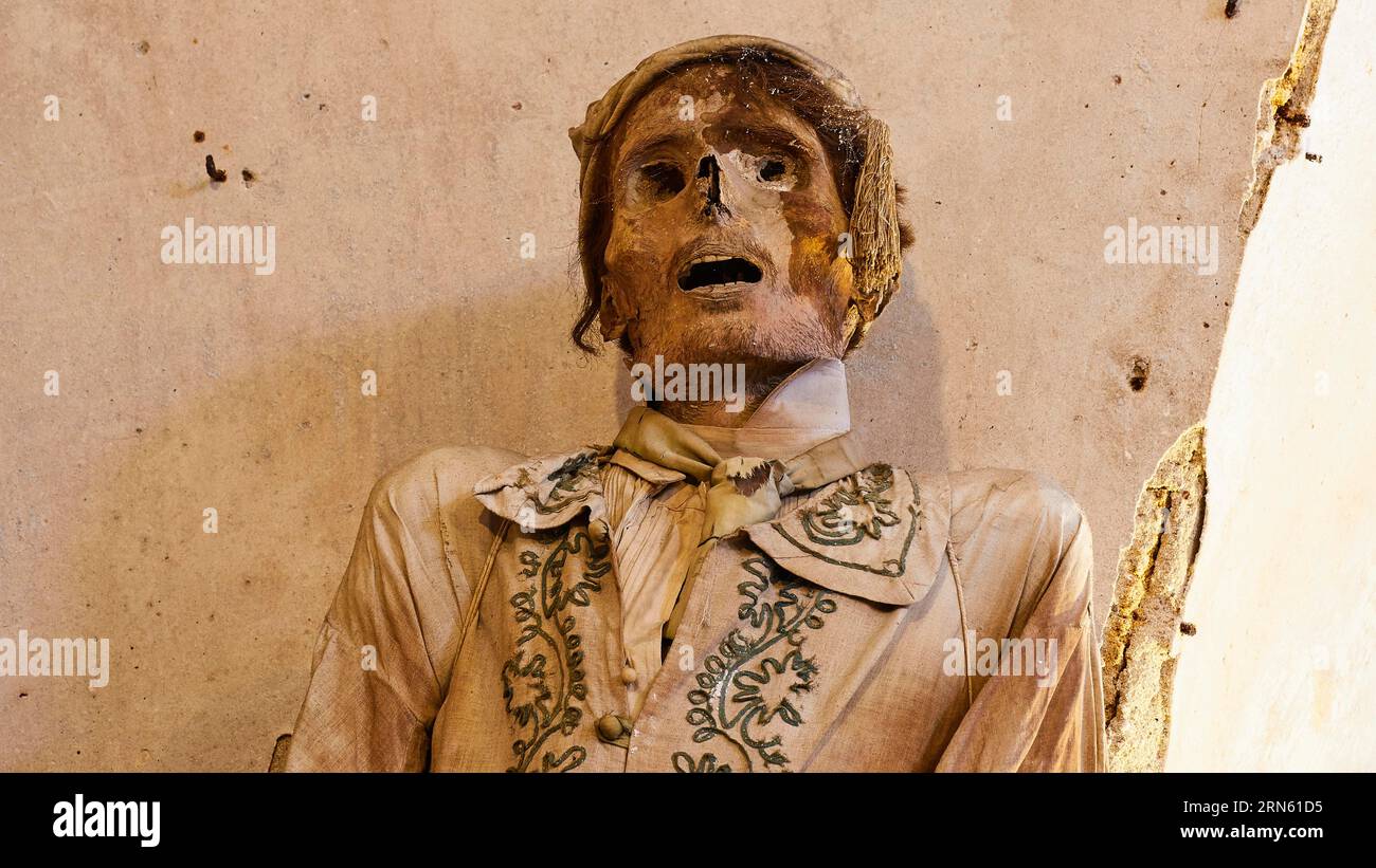Mummy of a woman, cap, elegant dress, Catacombe dei Cappuccini ...