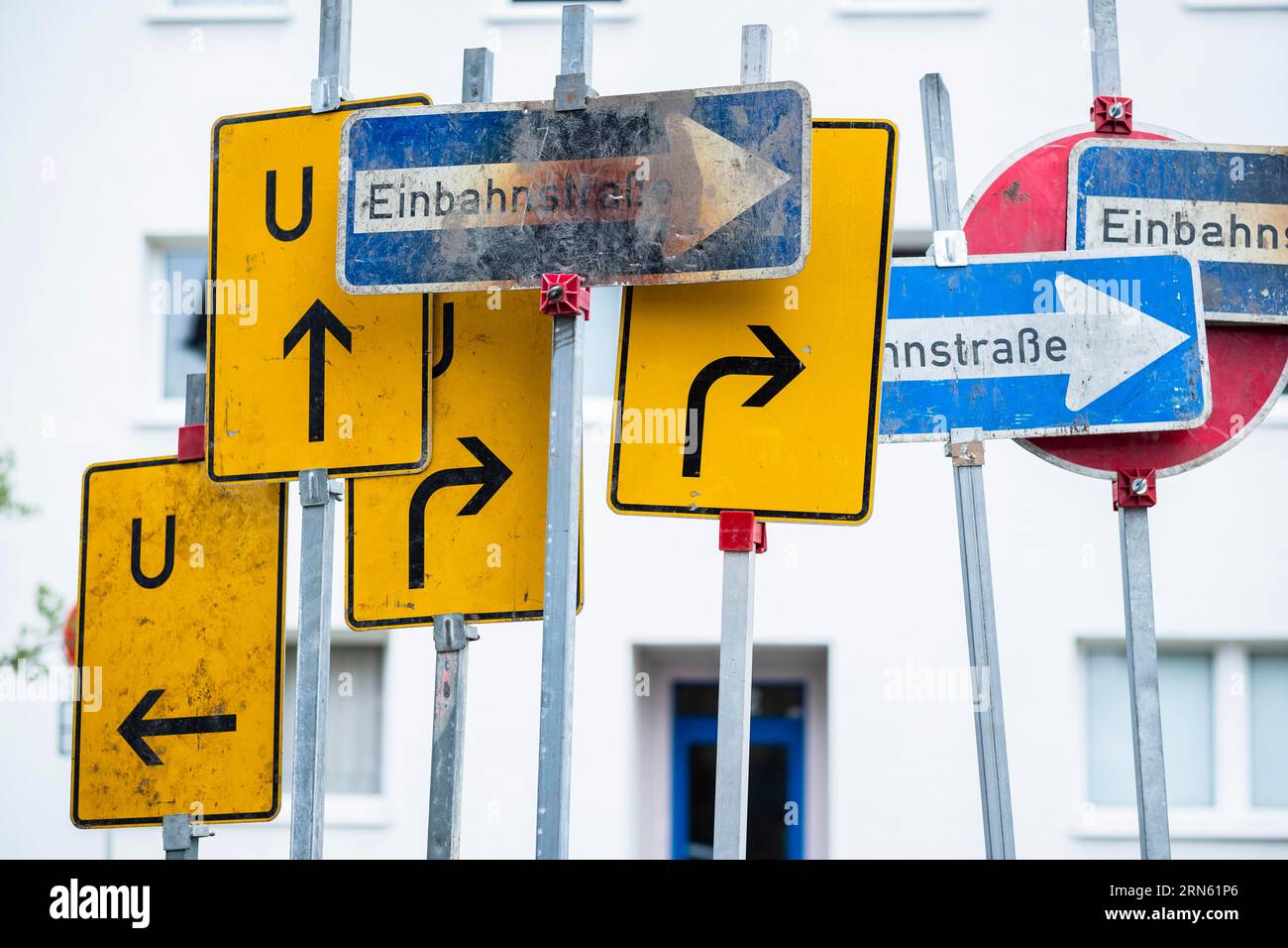 Many traffic signs, one-way street, diversion, symbol image Stock Photo ...