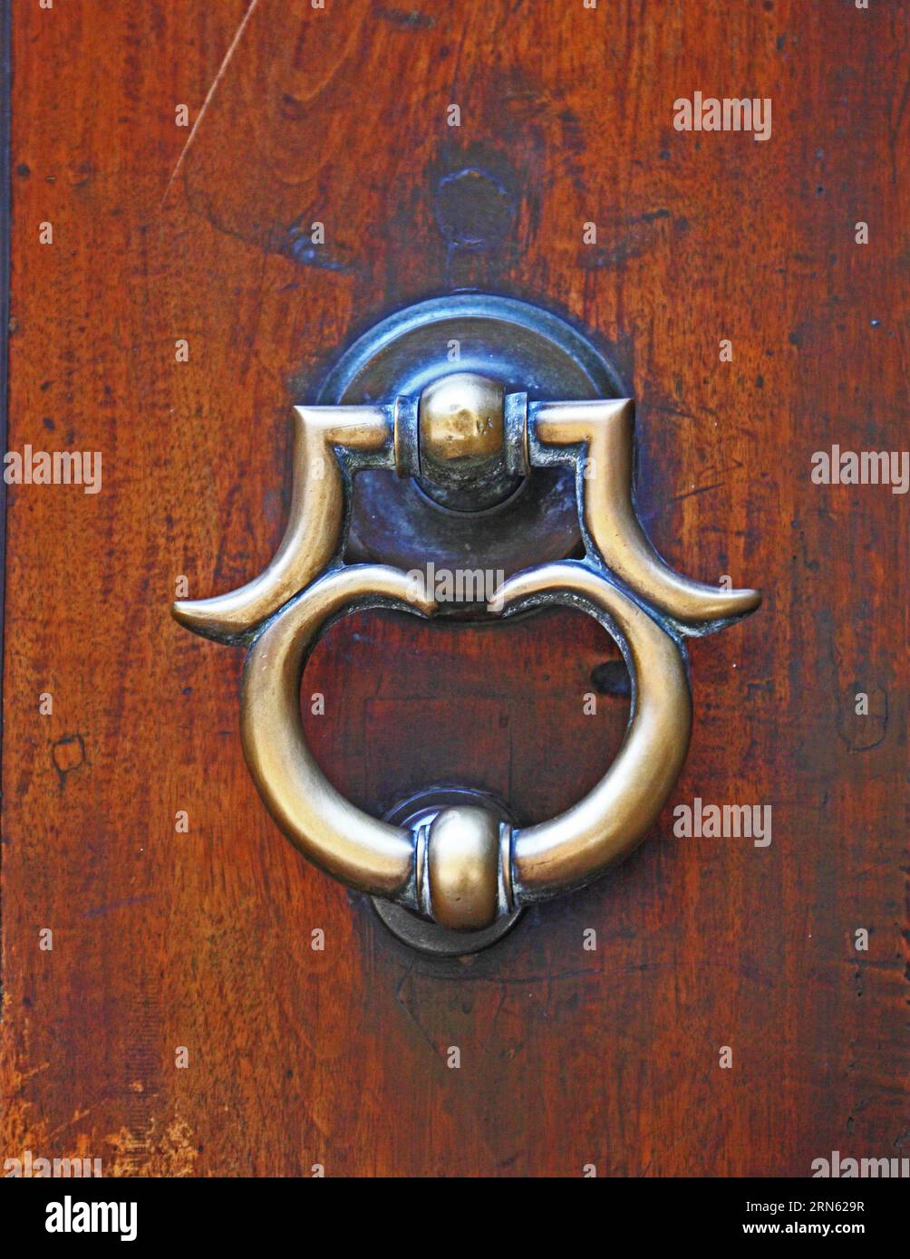 The antique wooden door with handle Stock Photo - Alamy