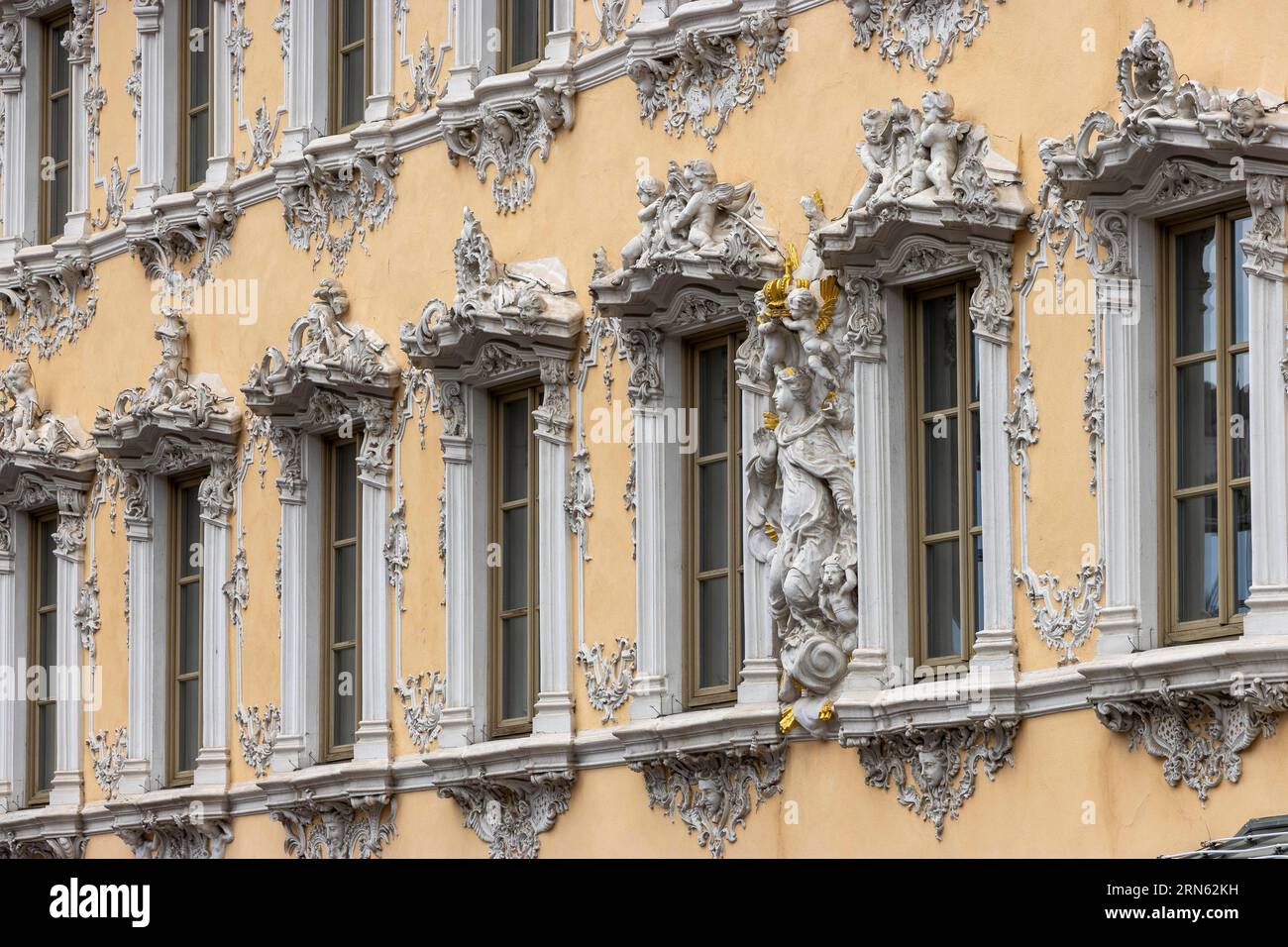 Windows of the Falcon House with stucco facade and rococo-style ...