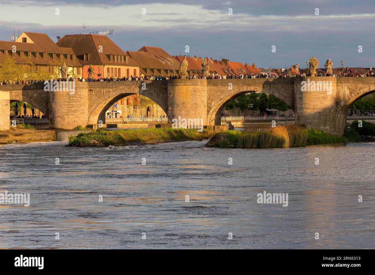Old Main Bridge, built 1476-1703, with statues of saints and tourists ...