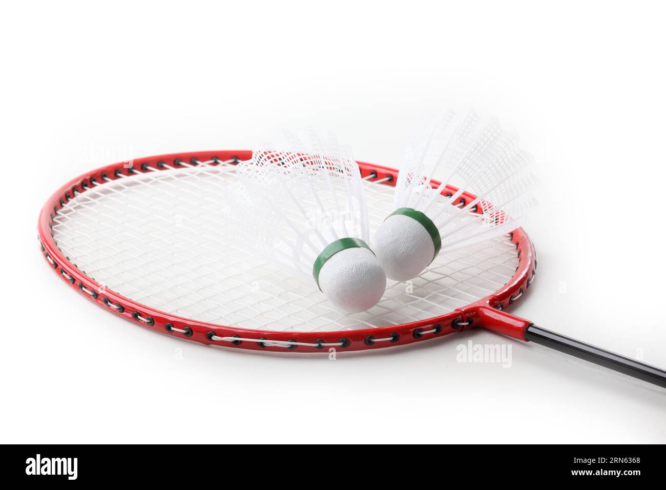 Badminton rackets and shuttlecock isolated on white background Stock ...