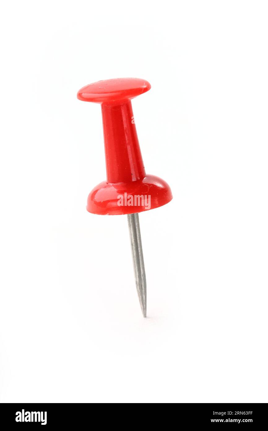 The closeup of red push pin isolated on white background Stock Photo ...