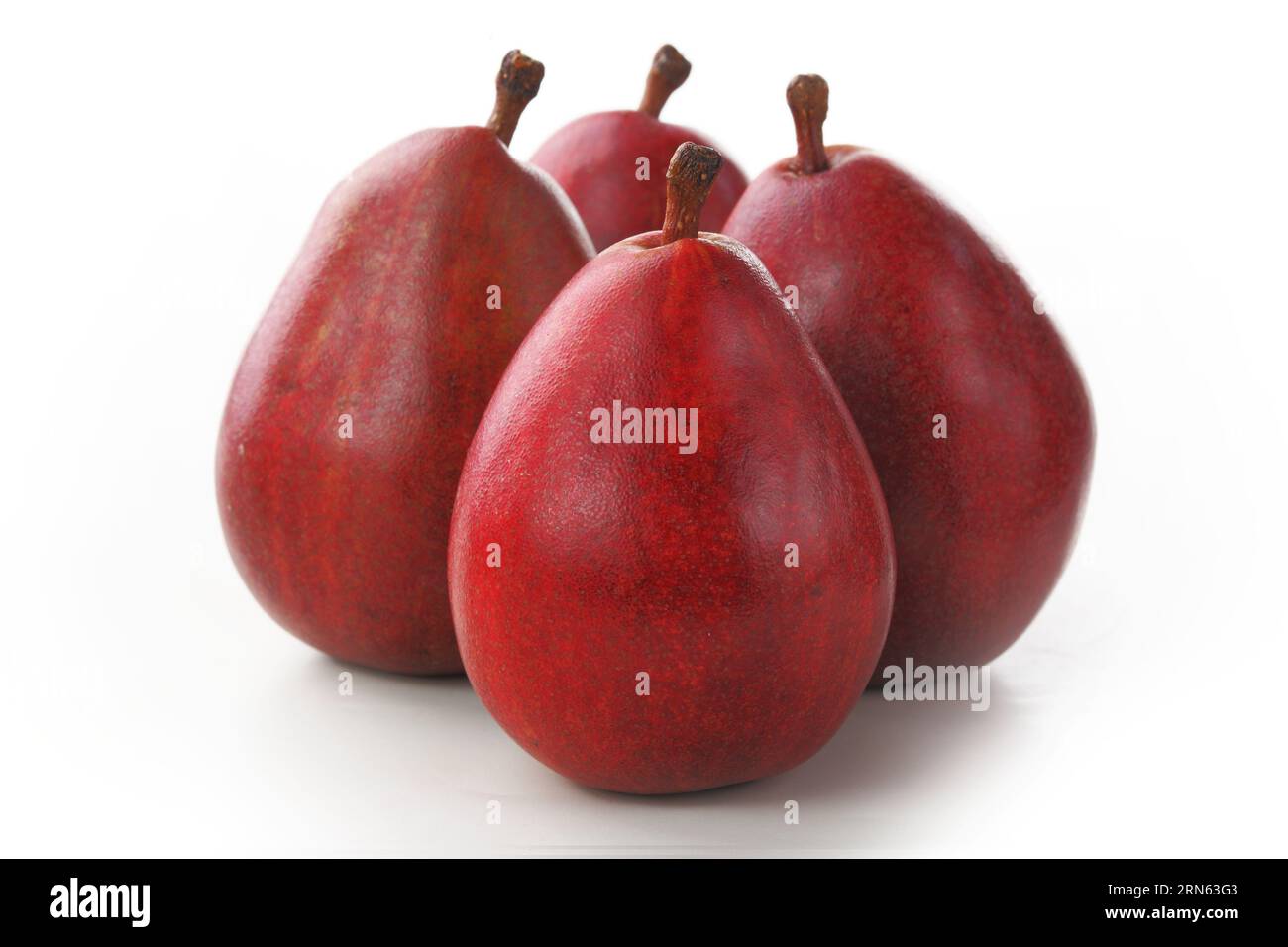 The red pears isolated on white background Stock Photo - Alamy