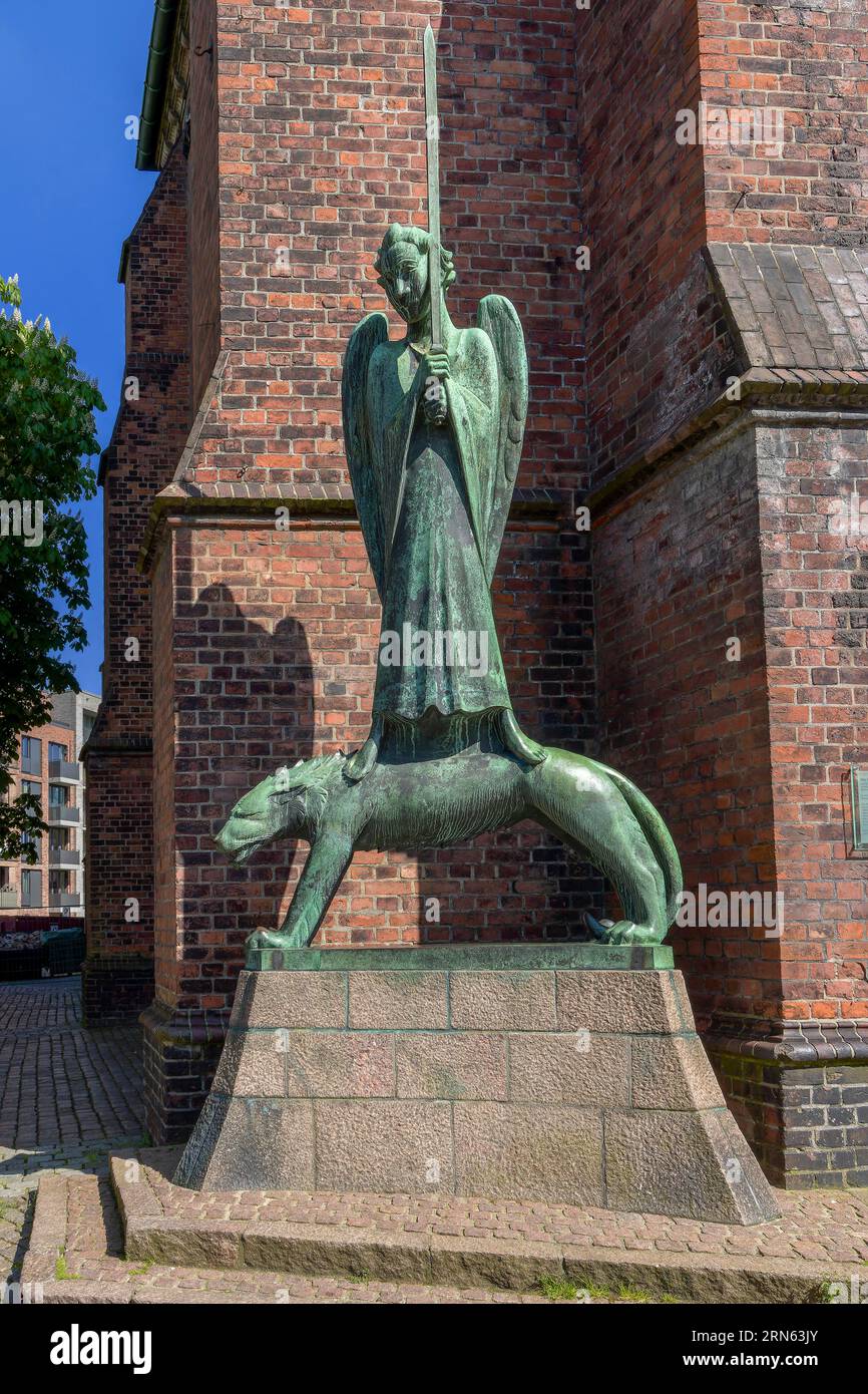 Bronze sculpture The Spirit Fighter in front of the church of St ...