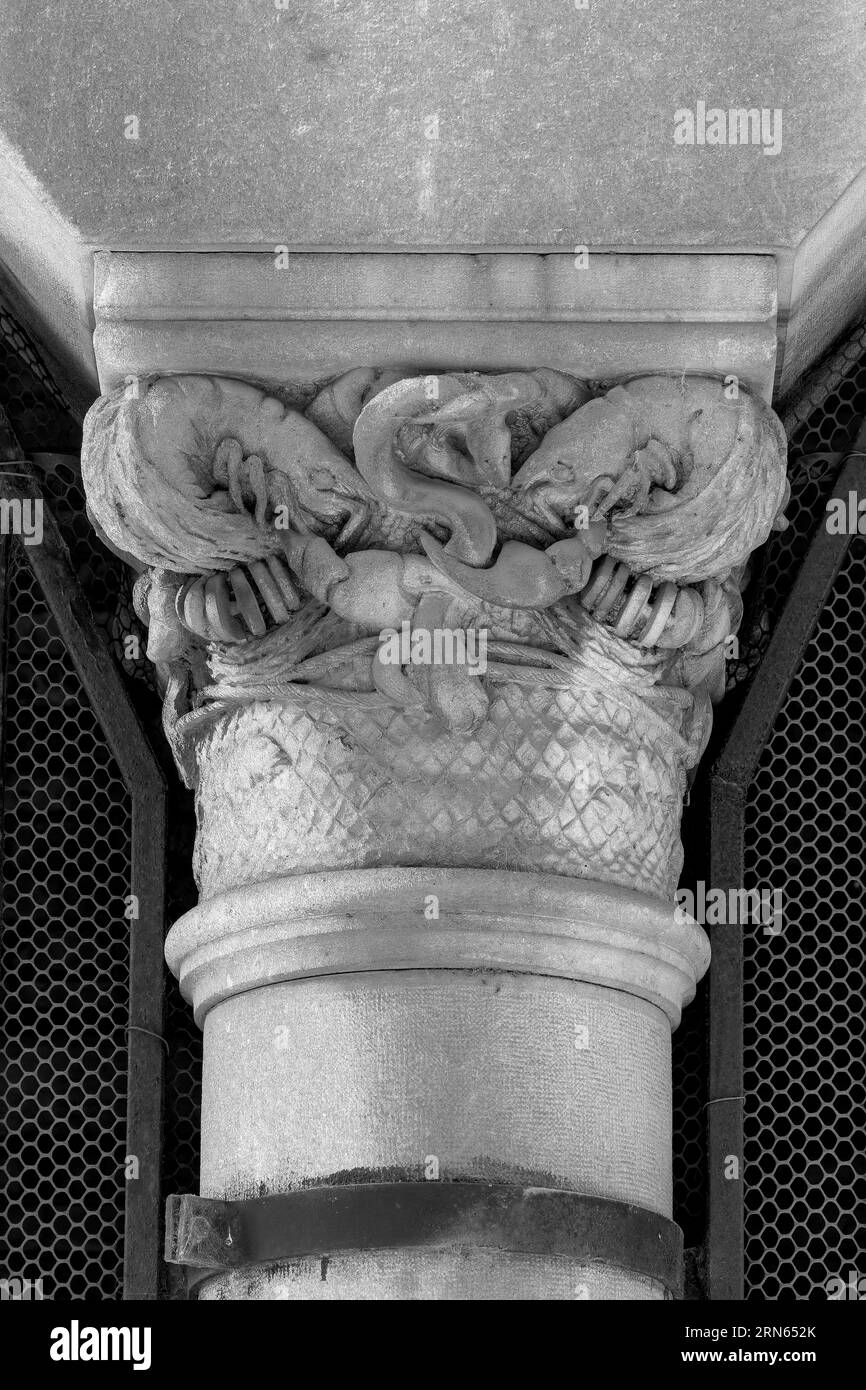 Decorative part of a supporting column with motifs of crabs, octopuses ...