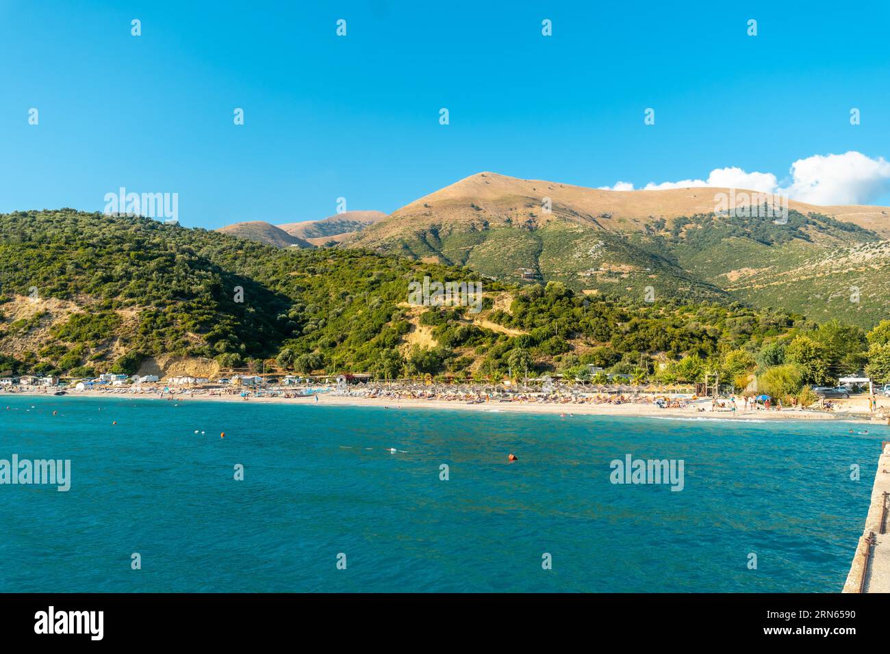 Albanian riviera beach with sunbeds near Vlore in summer vacation ...