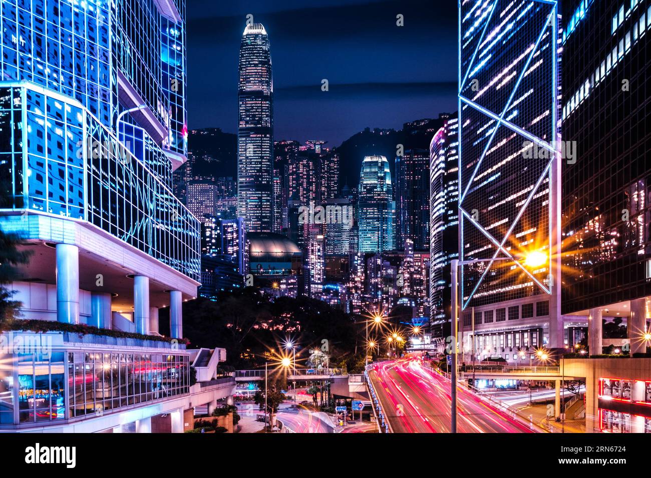 Abstract mega city at night, illuminated skyscraper buildings Stock ...