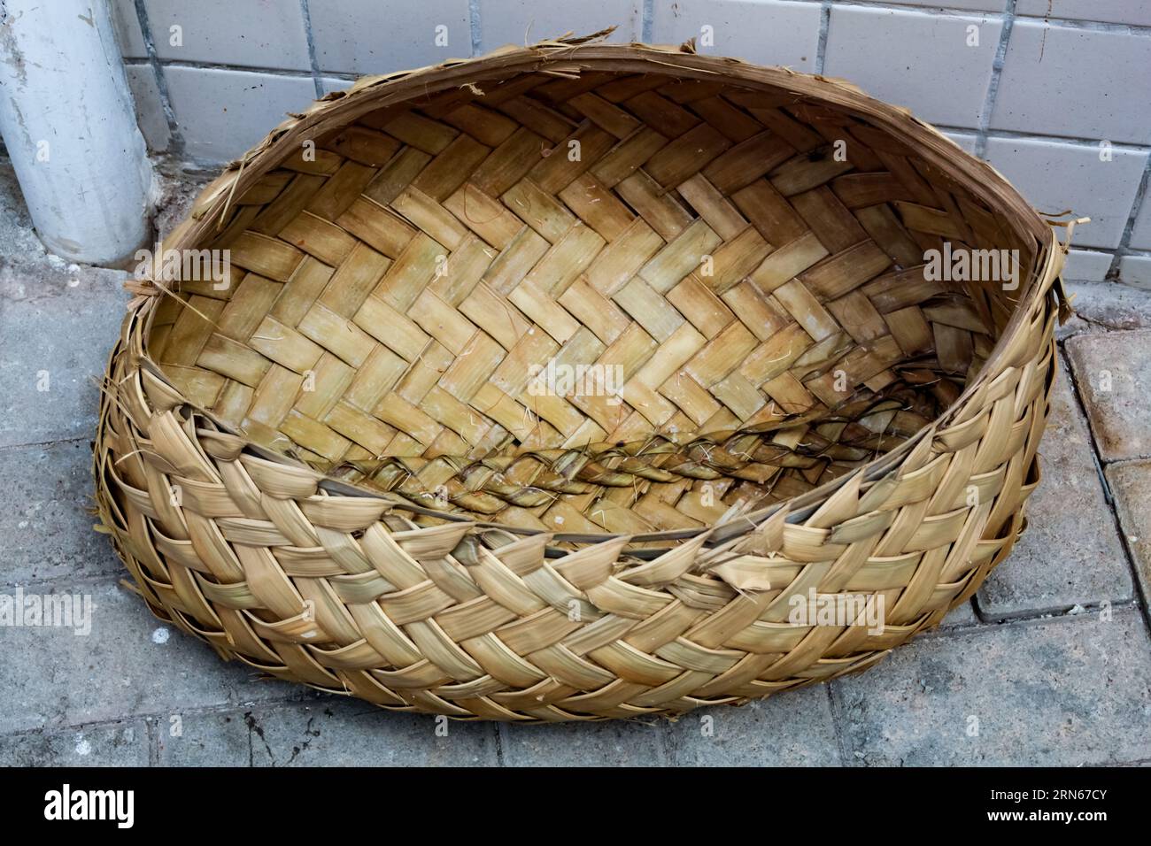 Rustic baskets, made from the straw of the babassu palm tree, called ...