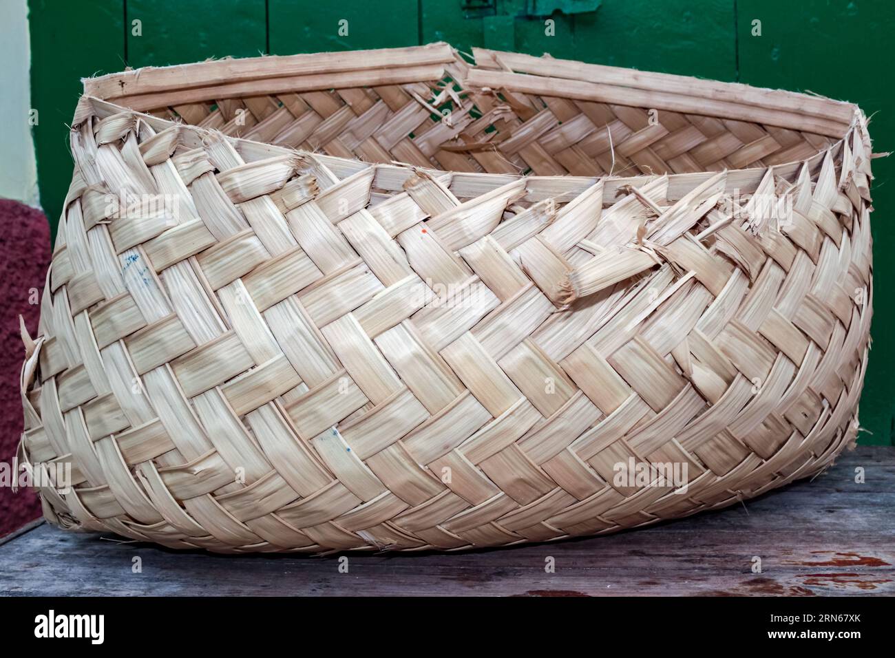 Rustic baskets, made from the straw of the babassu palm tree, called ...