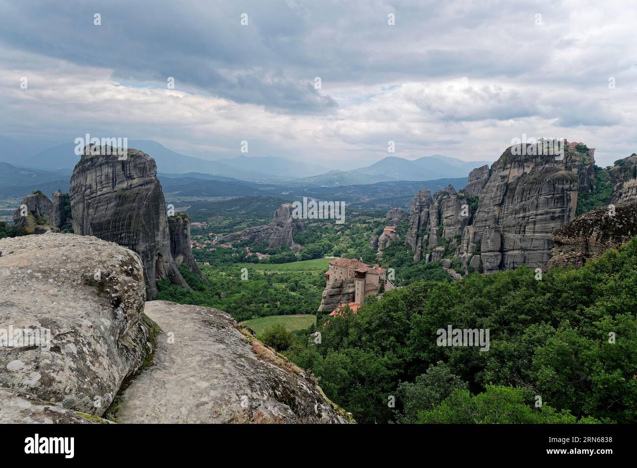 The monastery of Roussanou and behind it the monastery of Agios ...