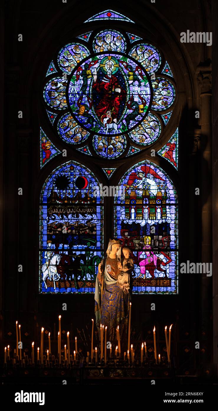 Interior view of Madonna and Child, stained glass window, sacrificial ...