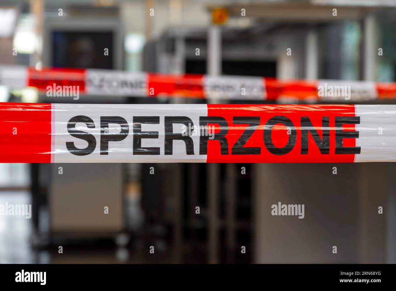 Restricted zone, barrier tape at Munich Airport Stock Photo - Alamy