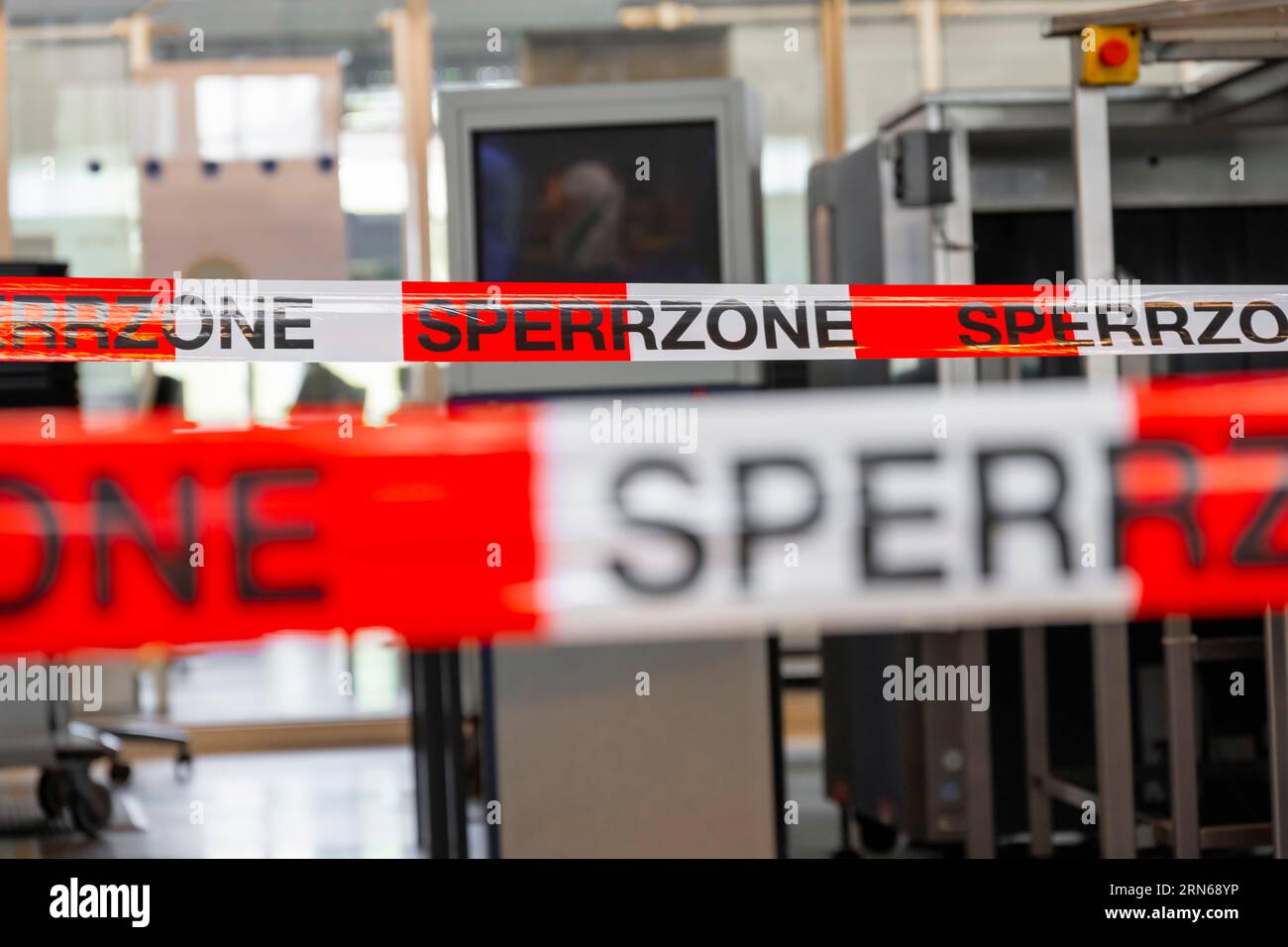 Restricted zone, barrier tape at Munich Airport Stock Photo - Alamy