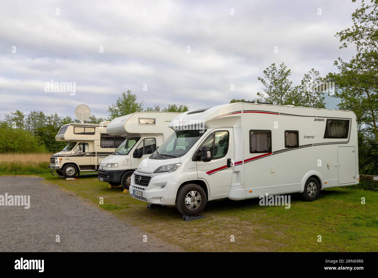 Three camper vans at the camper van site Buesum, Buesum, Nordfriesland ...