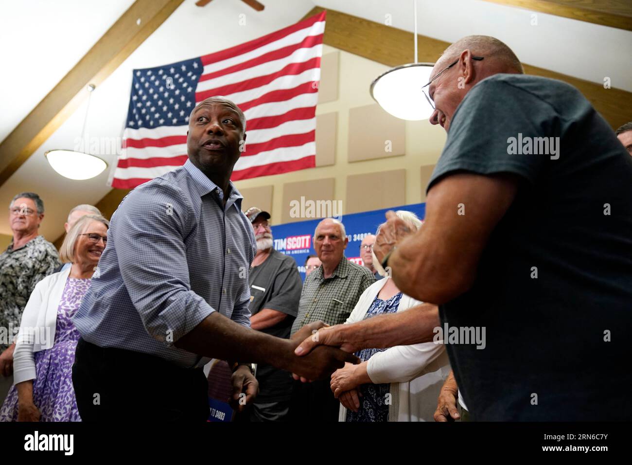 Republican presidential candidate Sen. Tim Scott, R-S.C., greets ...
