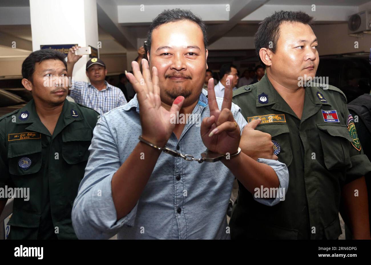 Handcuffed in court hi-res stock photography and images - Alamy