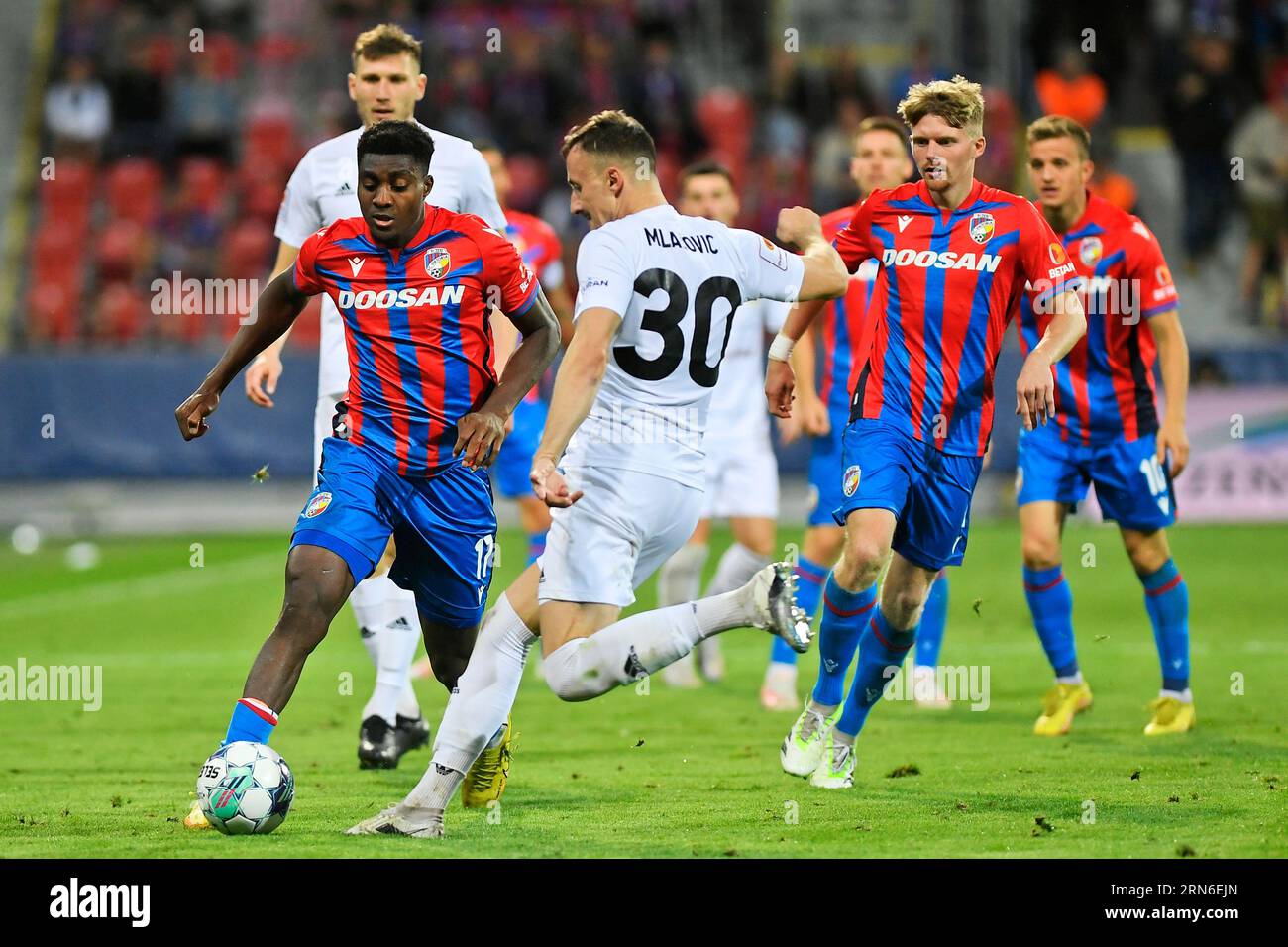 Pilsen, Czech Republic. 31st Aug, 2023. Rafiu Durosinmi of Plzen, left ...