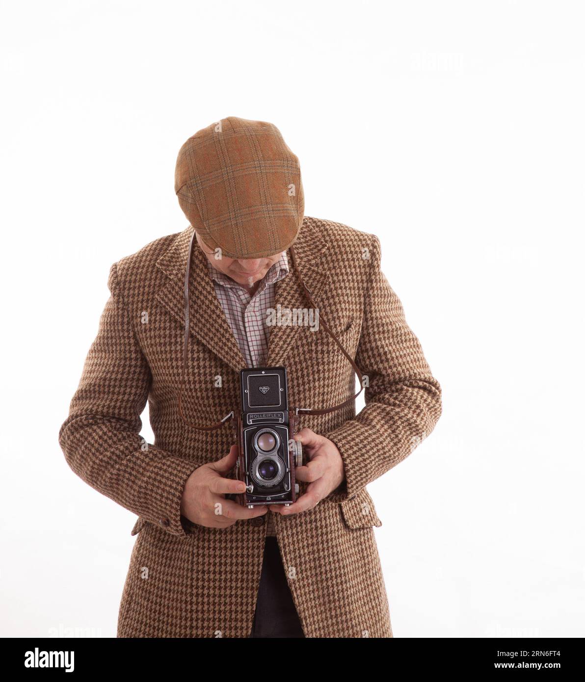 A mature Englishman photographer in classic tweeds Stock Photo - Alamy