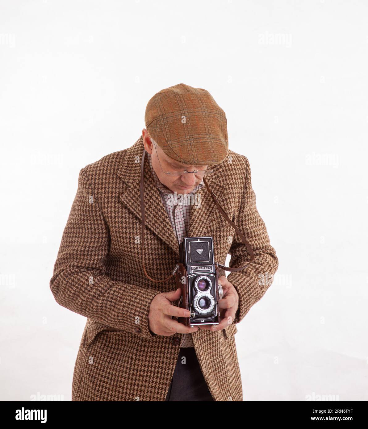 A mature Englishman photographer in classic tweeds Stock Photo - Alamy