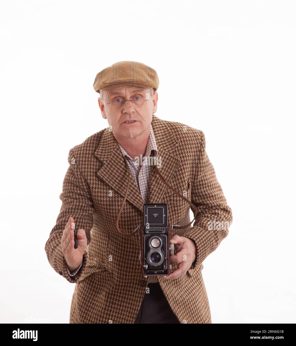 A mature Englishman photographer in classic tweeds Stock Photo - Alamy