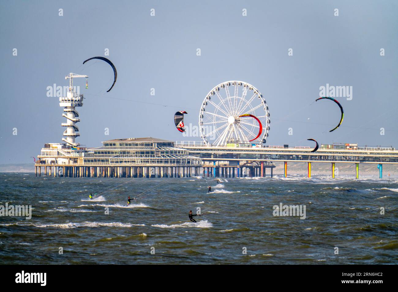 The pier and Ferris wheel at the Scheveningen stand, strong swell ...