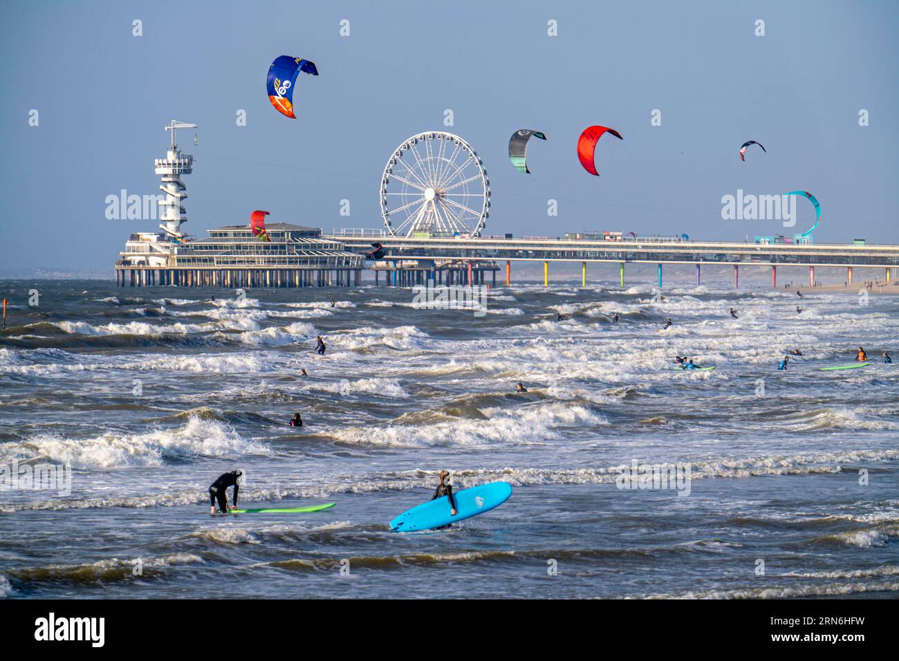 The pier and Ferris wheel at the Scheveningen stand, strong swell ...