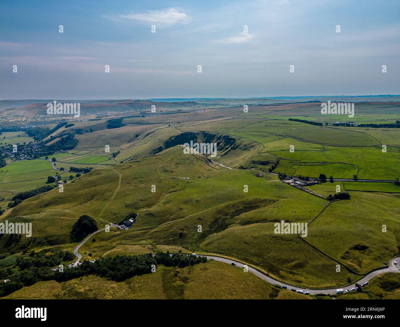 An aerial view of the Hills of Mam Tor in the Peak District winding ...