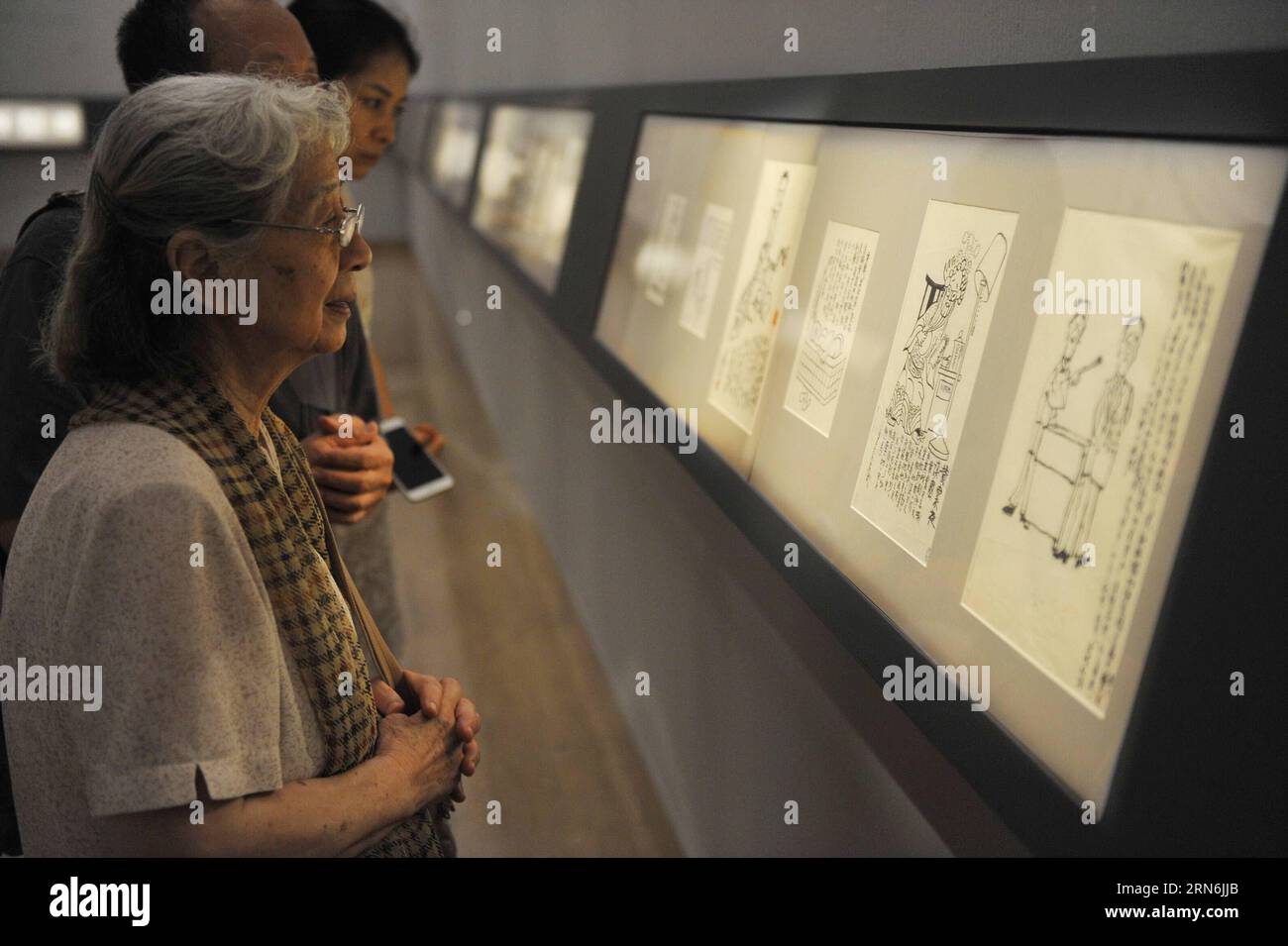 (150730) -- BEIJING, July 30, 2015 -- People visit an exhibition to ...