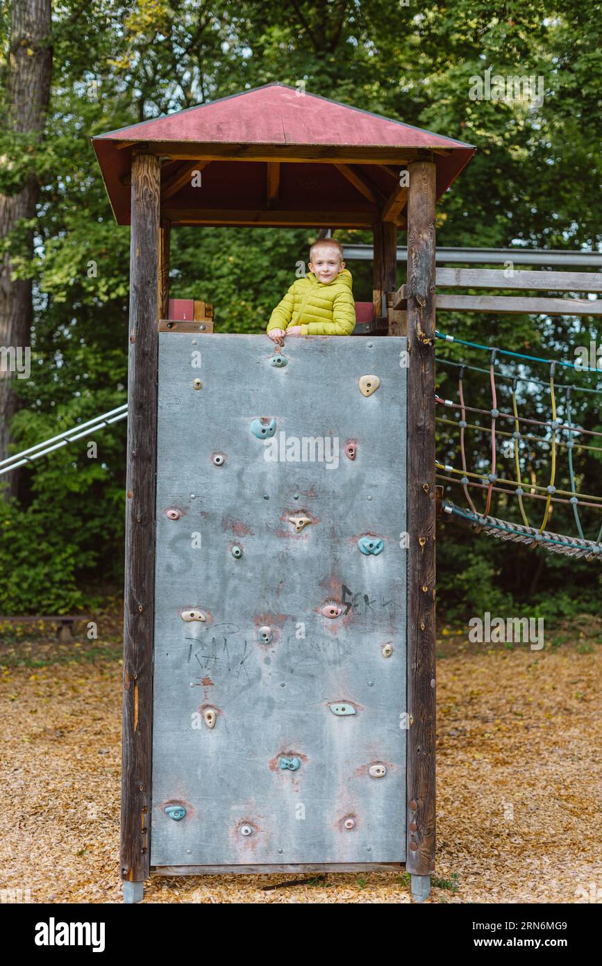 Boy At The Climbing Wall Without A Helmet, Danger At The Climbing Wall ...