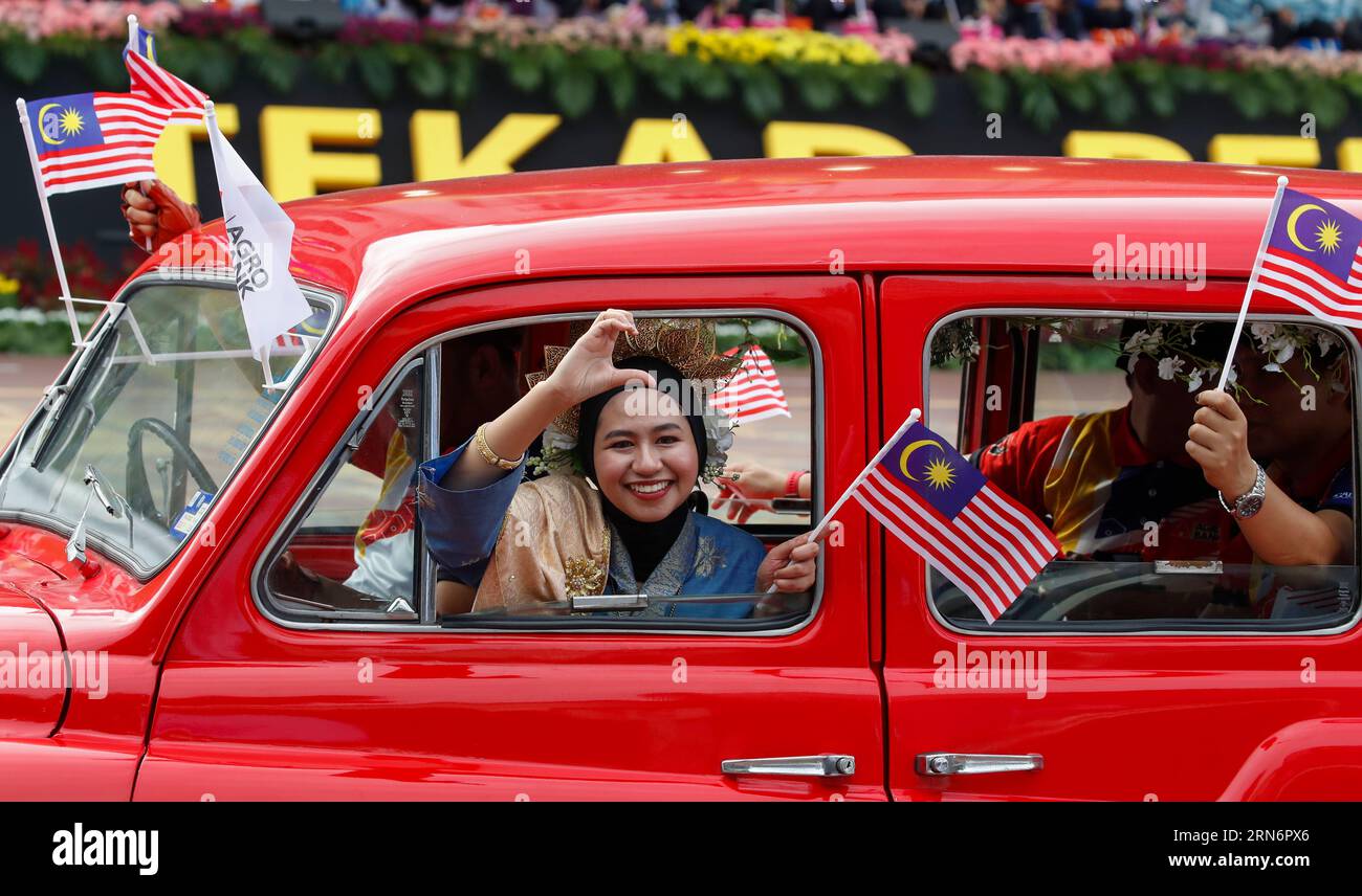 Kuala Lumpur, Malaysia. 31st Aug, 2023. Malaysians dressed in ...