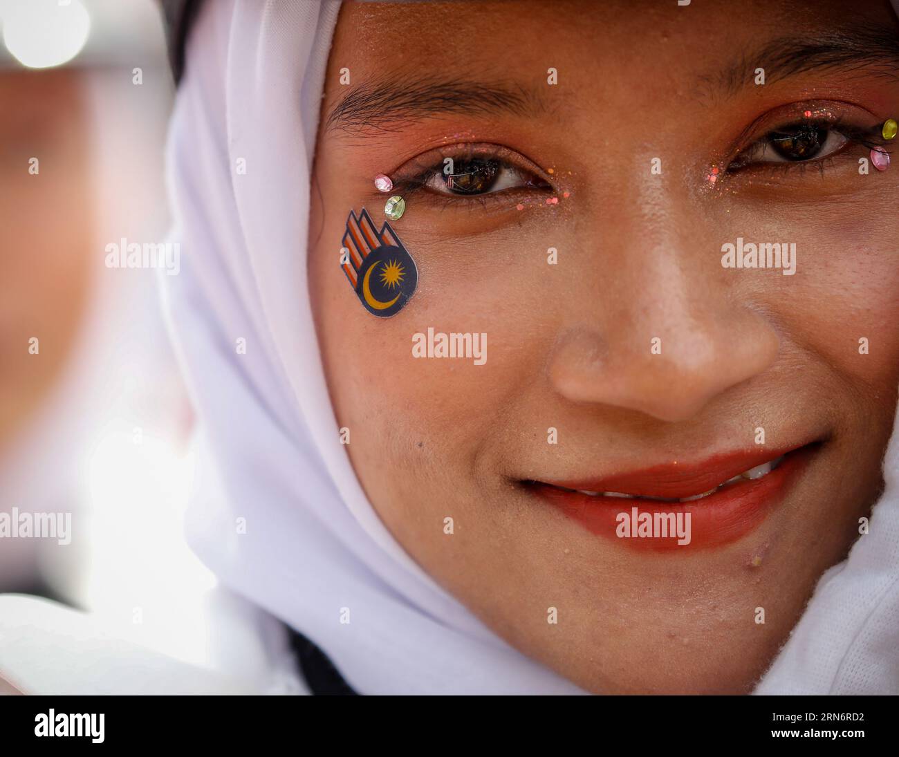 Kuala Lumpur, Malaysia. 31st Aug, 2023. A student with her face painted ...