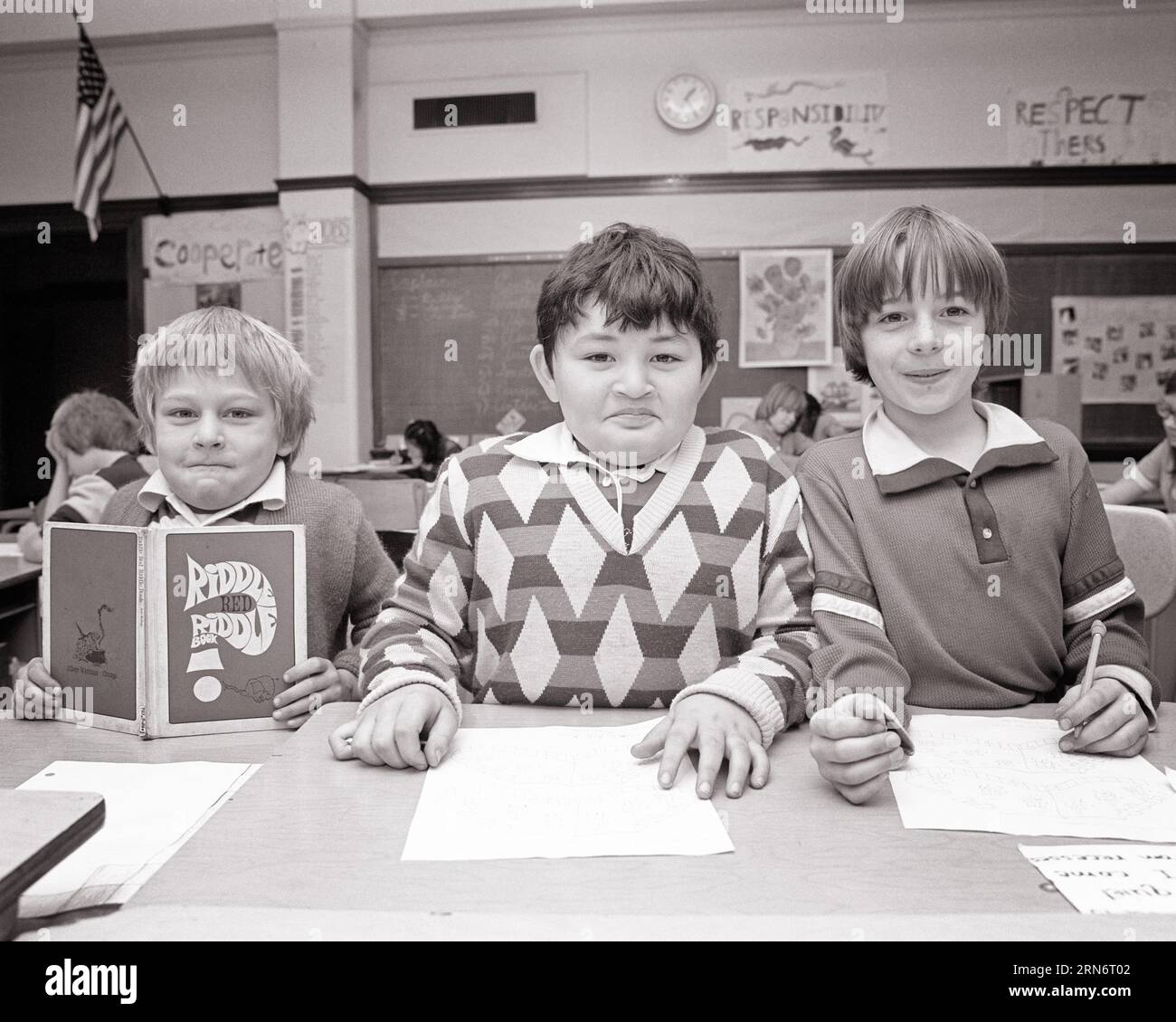 1970s 1980s THREE BOYS IN SCHOOL CLASSROOM FUNNY SMILING FACIAL ...