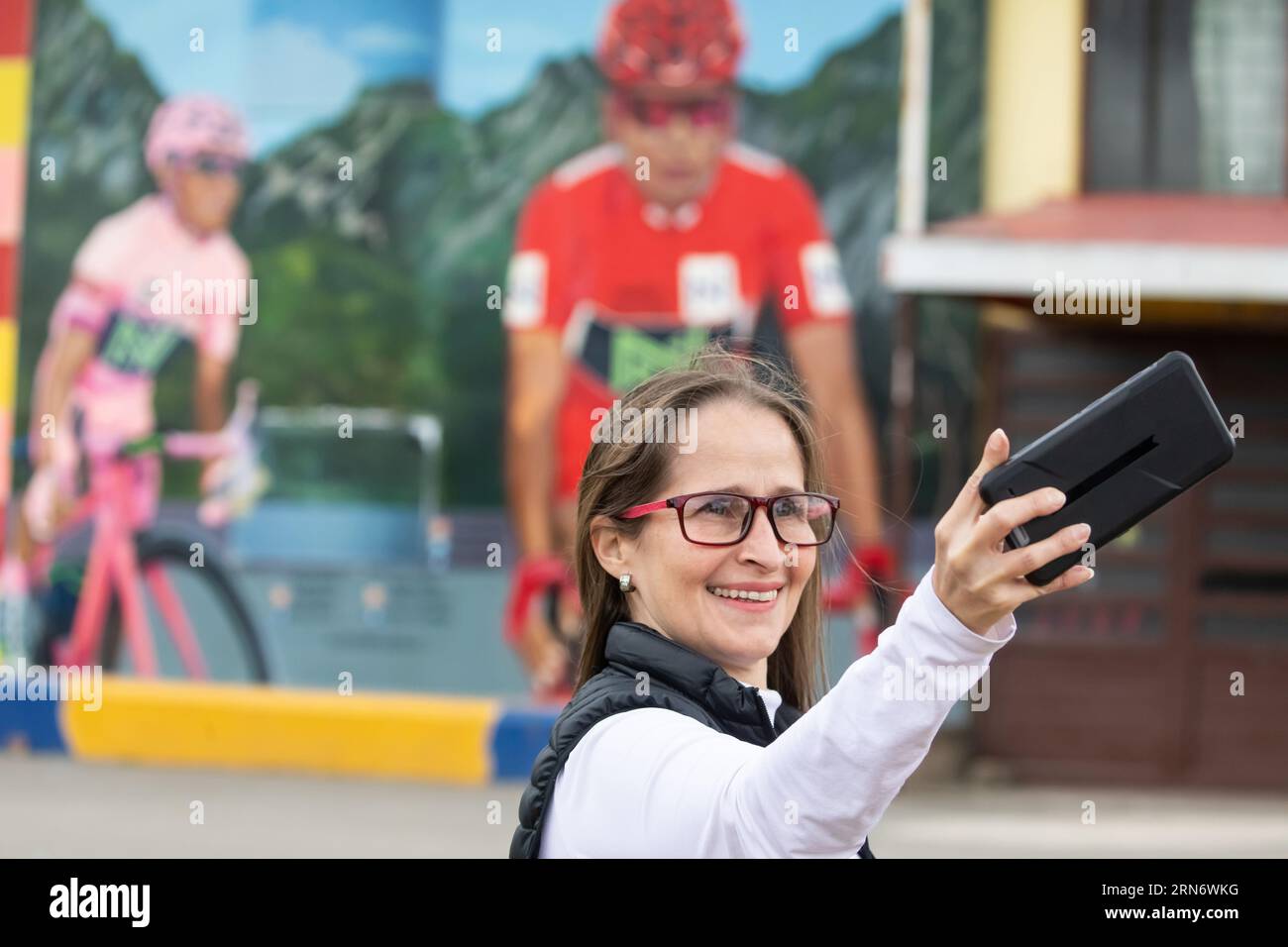COMBITA, COLOMBIA - AUGUST 2023. Female tourist taking a selfie at the ...