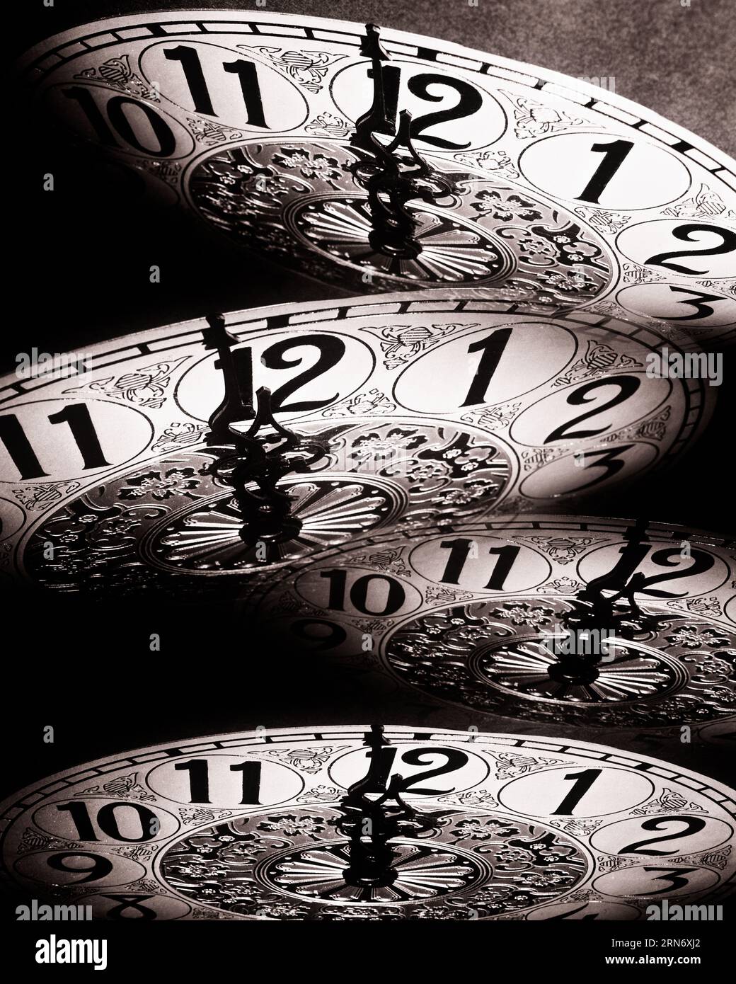 1960s MONTAGE OF ORNATE CLOCK FACES ABOUT TO STRIKE THE MIDNIGHT HOUR ...