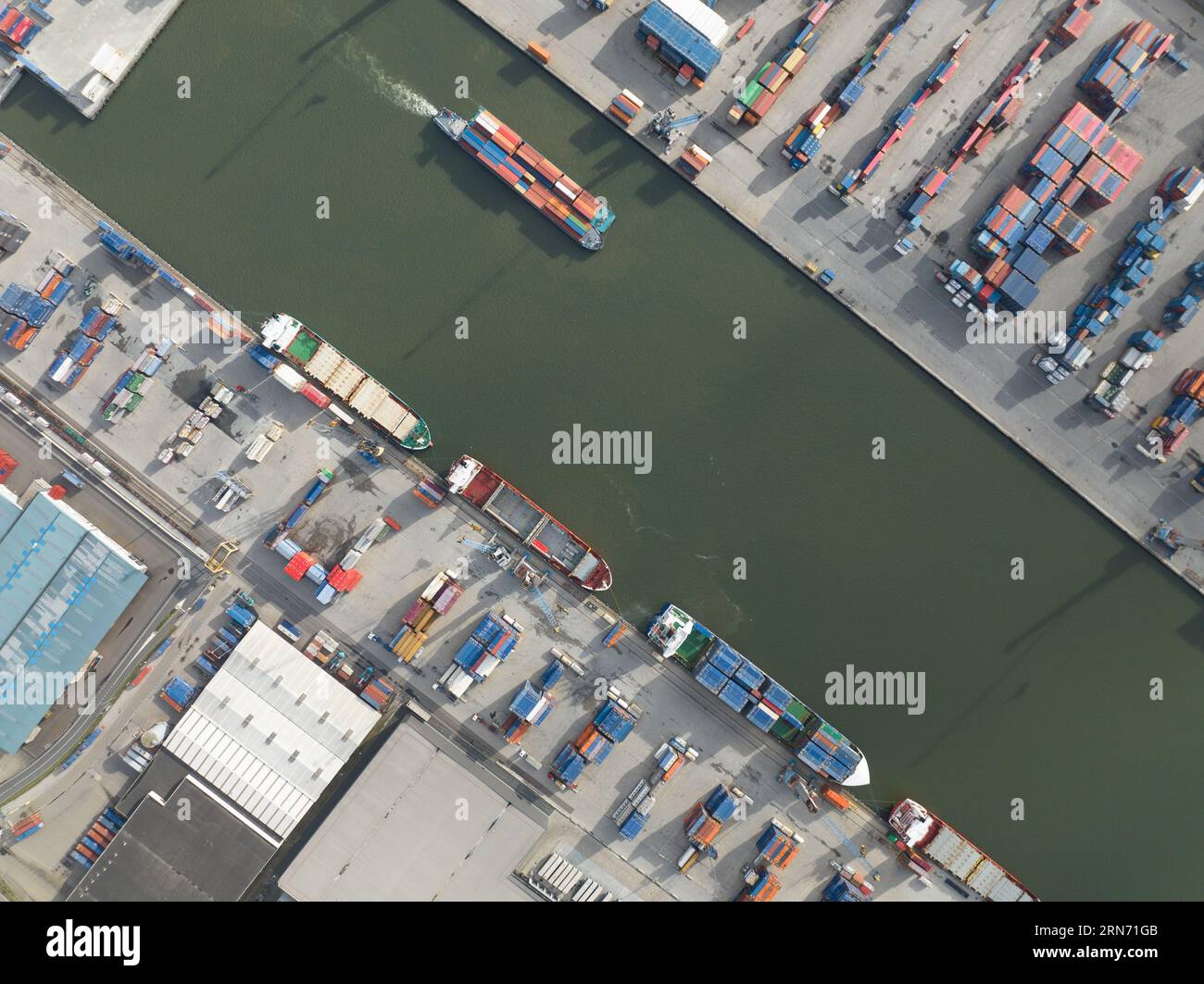 Top down aerial drone view of container terminal in the port of ...
