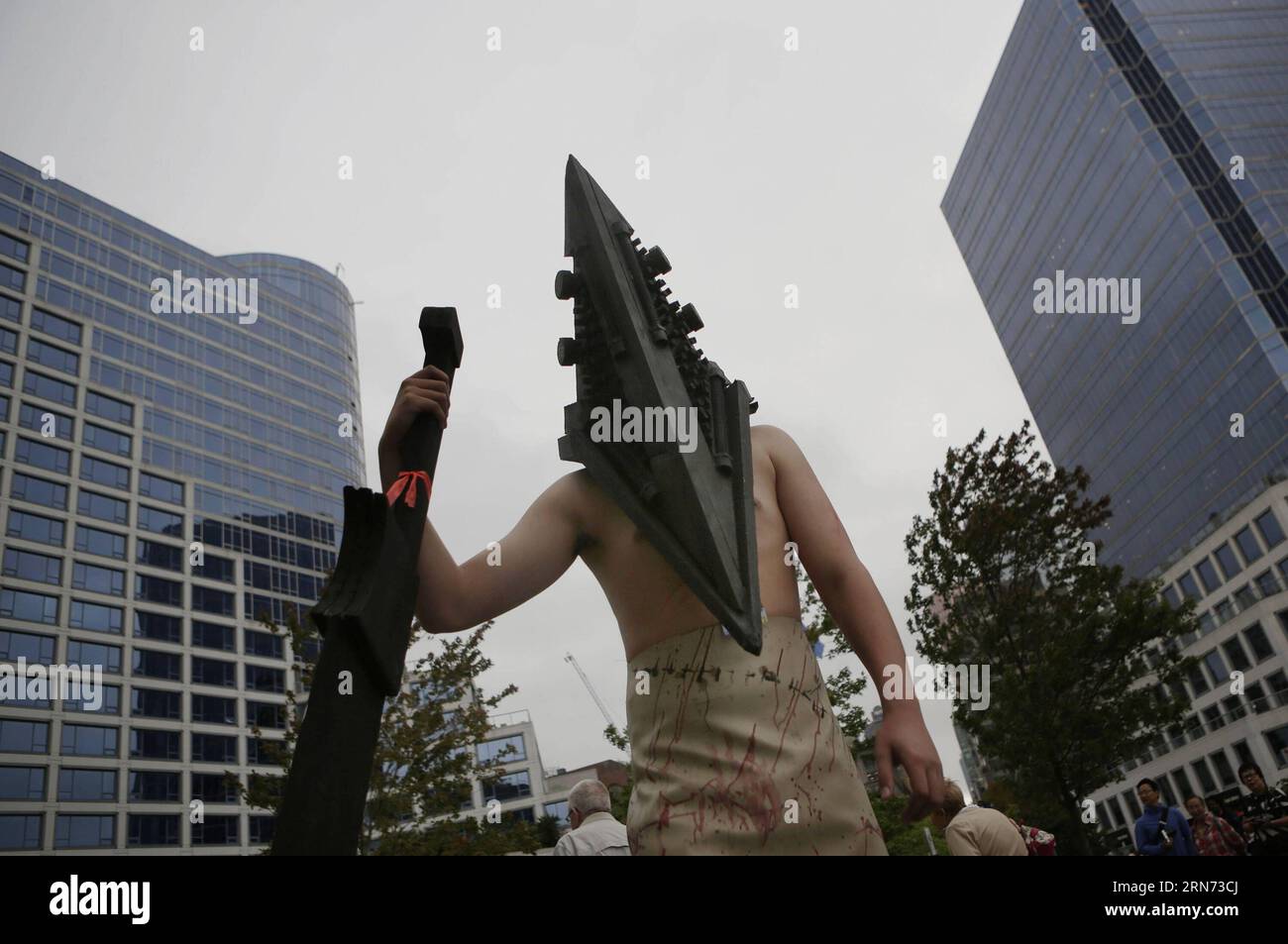 A participant in costume gestures during the Anime Revolution event at ...