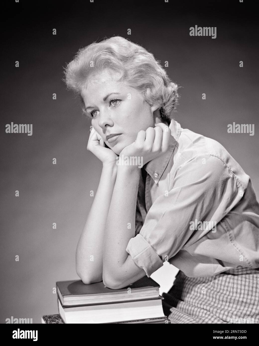 1950s SAD THOUGHTFUL BLONDE TEENAGE GIRL YOUNG WOMAN STUDENT RESTING ...