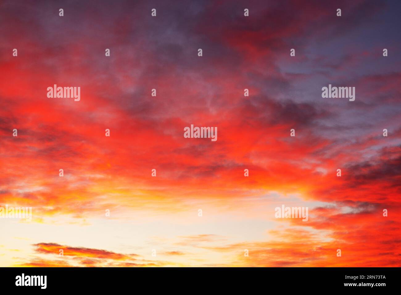 Textured background of beautiful sunset. Amazing red and yellow sunset ...