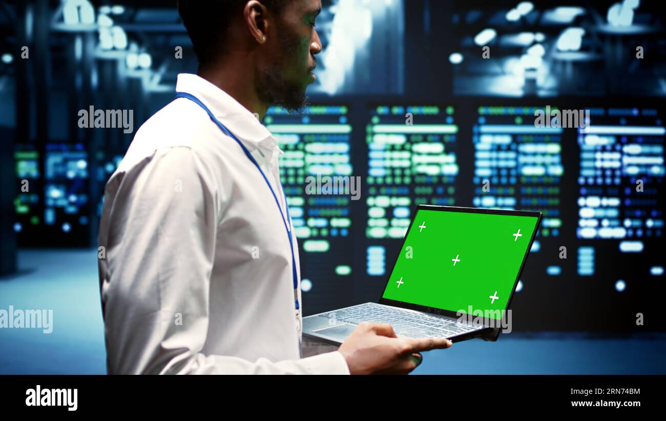 Developer Using Chroma Key Laptop To Do Checkup On High Bandwidth