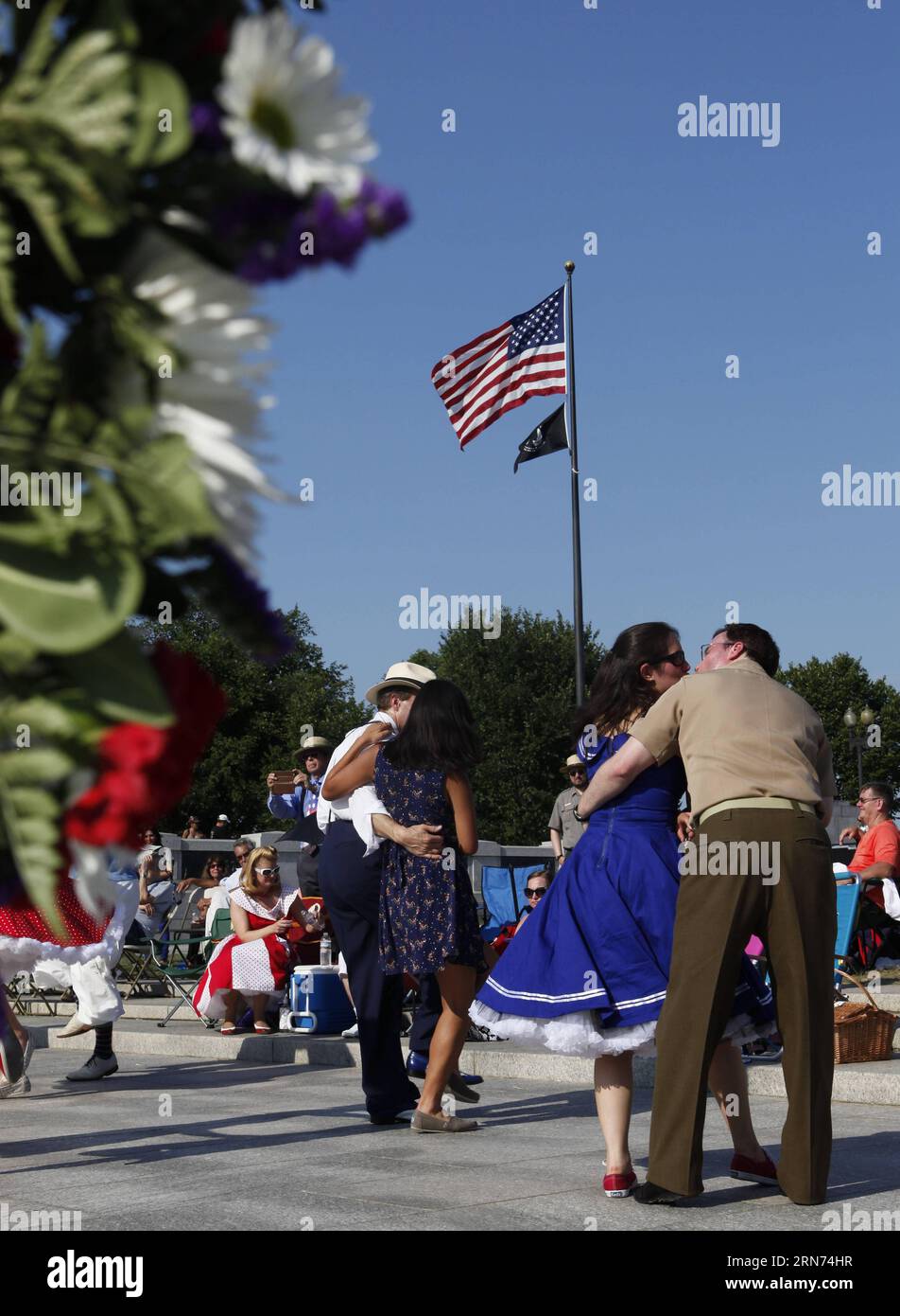 A group of dancers play swing dance at the National World War II ...