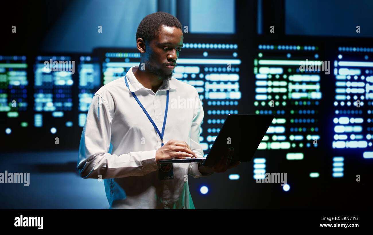 African american specialist ensuring server farm systems provide ...