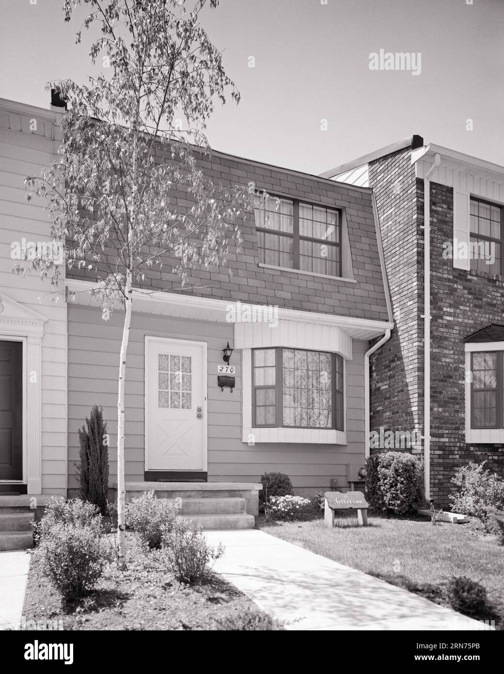 1970s FRONT OF ATTACHED TWO-STORY TOWNHOUSE WITH BAY WINDOW - b25587 ...