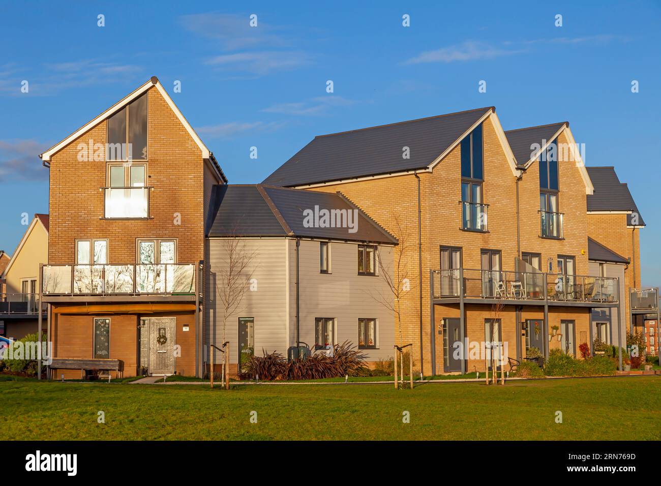 A new housing estate on a very early December morning. The sun’s ...