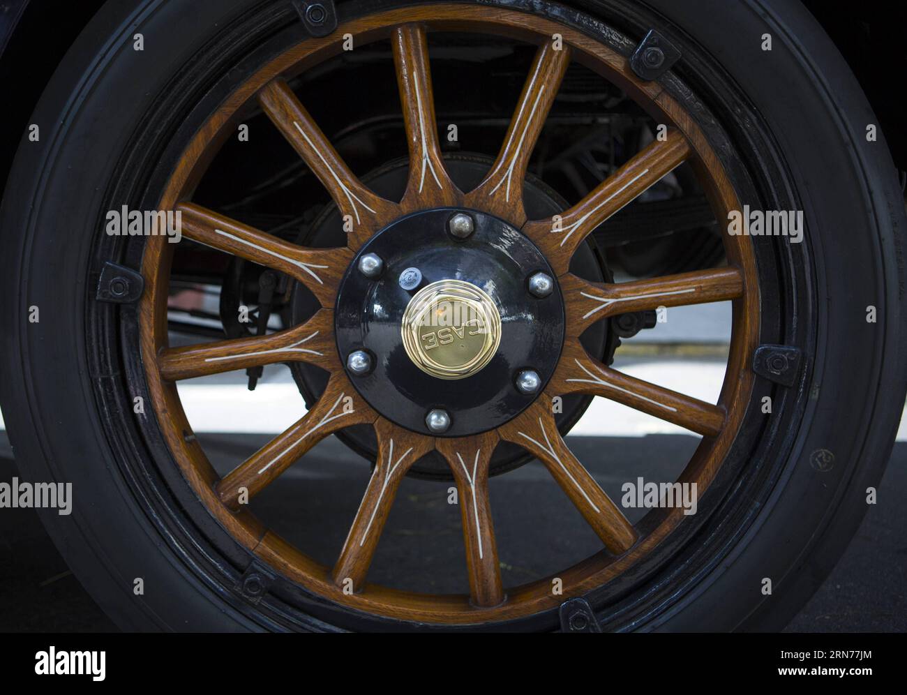 The tire with the rim of wood of a Case s car is displayed during an ...