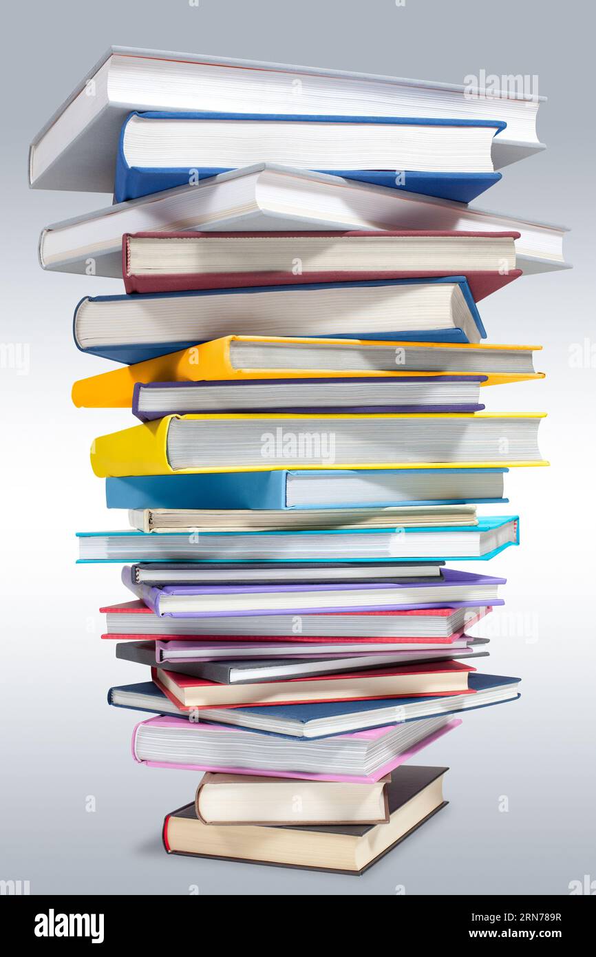 A large stack of books on white background Stock Photo - Alamy